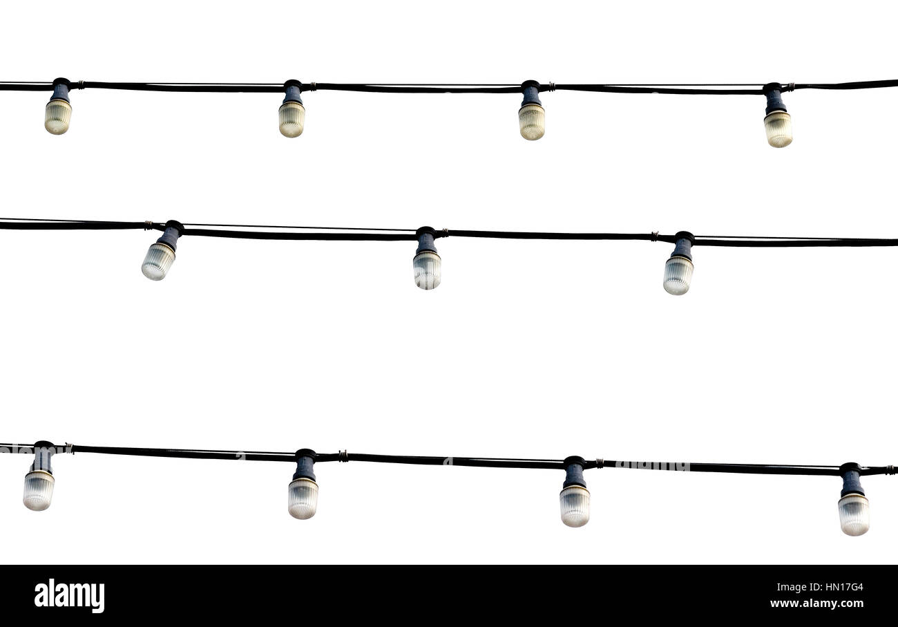 Decorative strings of lamps of street illumination isolated against ...