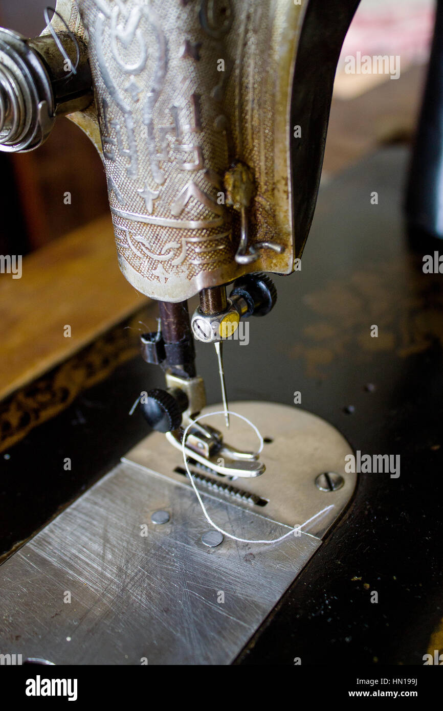 Singer sewing machine, old background Stock Photo - Alamy