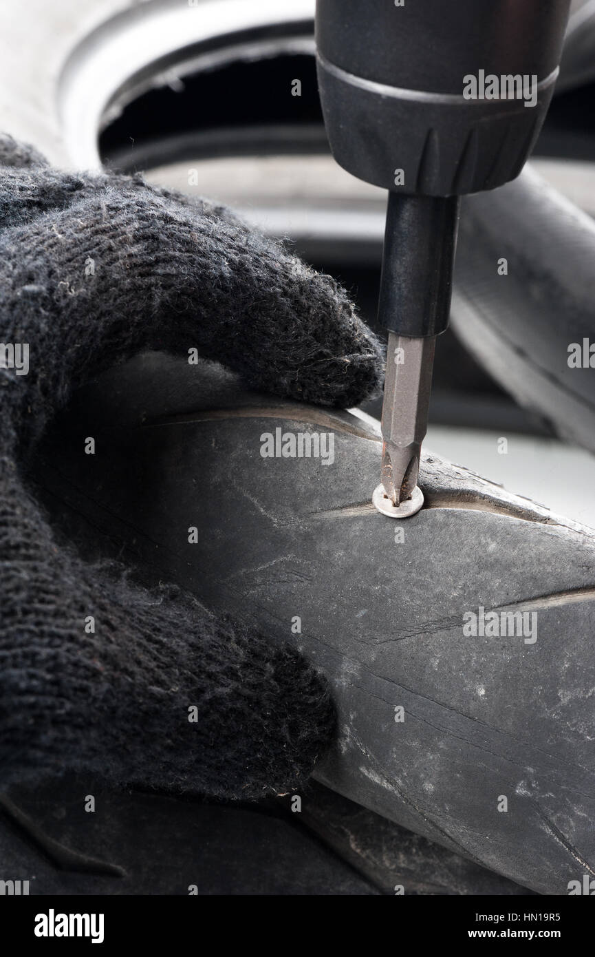 Tyre Nail Puncture Stock Photos & Tyre Nail Puncture Stock Images - Alamy