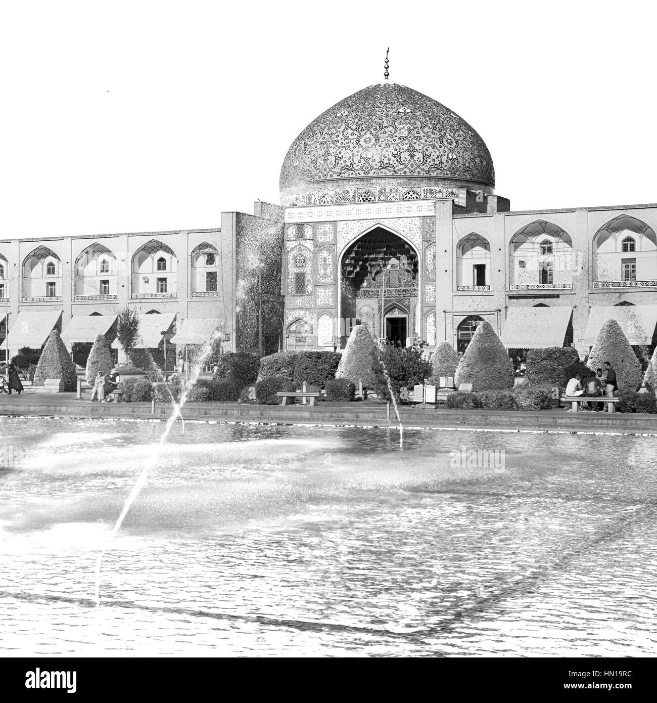 in iran old square mosque and fountain water backlight Stock Photo - Alamy