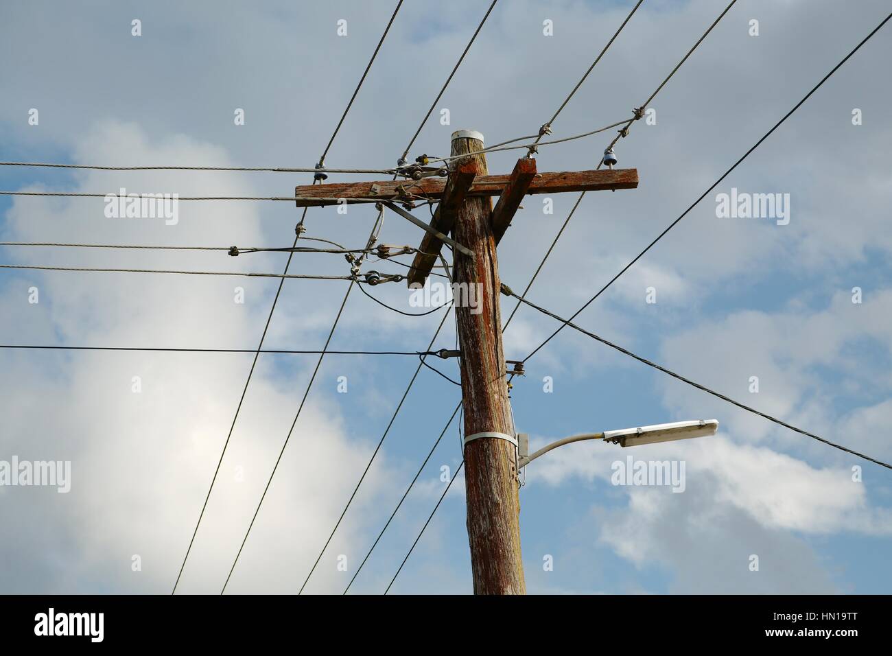 Electric lines on mast Stock Photo - Alamy