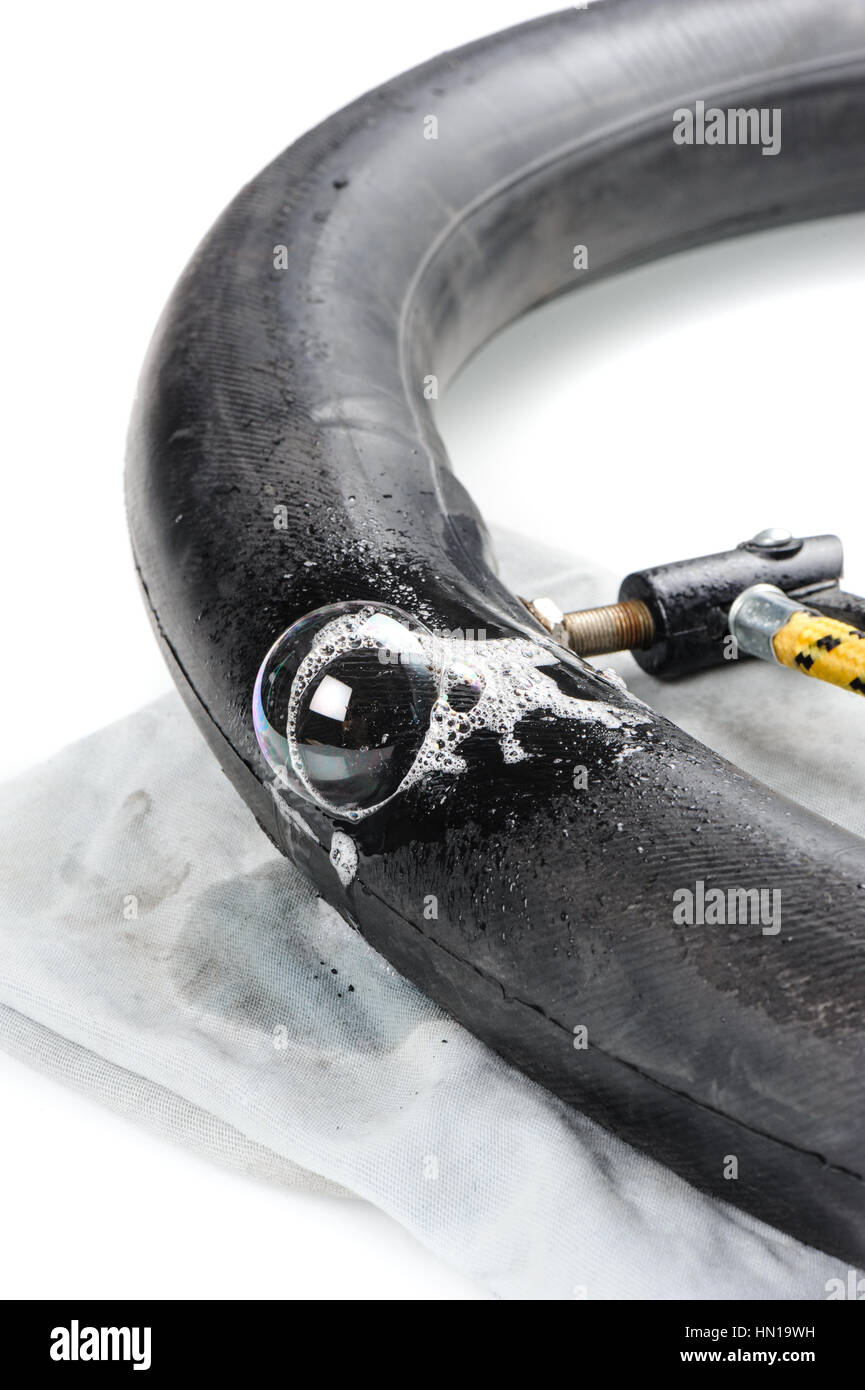 checking damage inner tire tube Stock Photo - Alamy