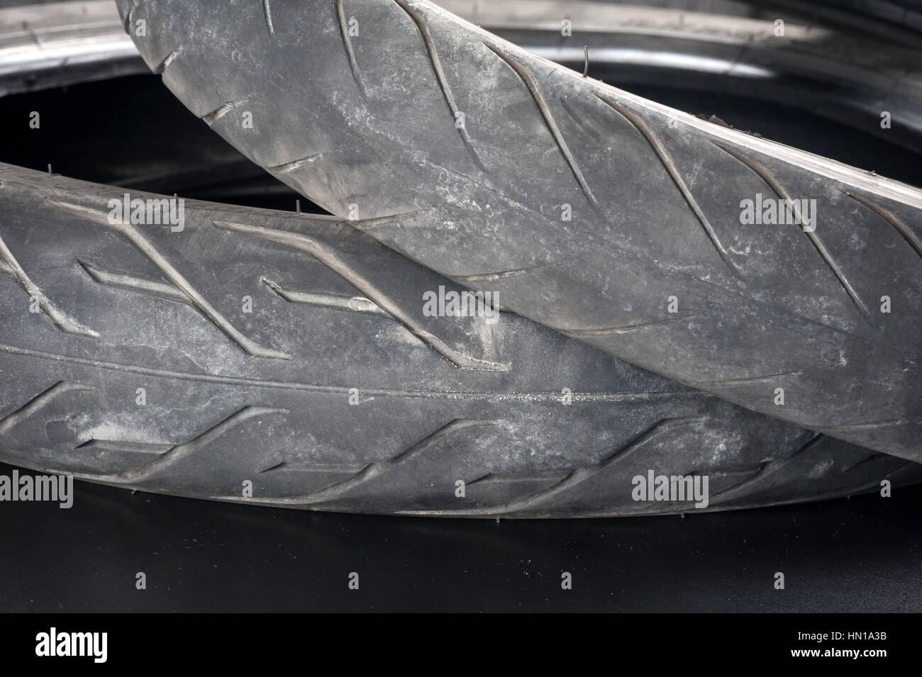 closeup old motorcycle rubber tires Stock Photo - Alamy