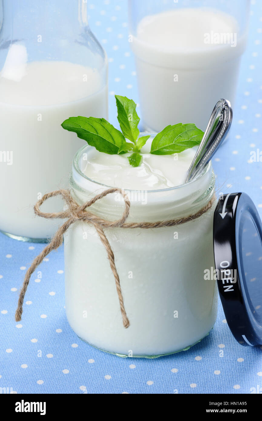 fresh natural yogurt in glass jar Stock Photo - Alamy