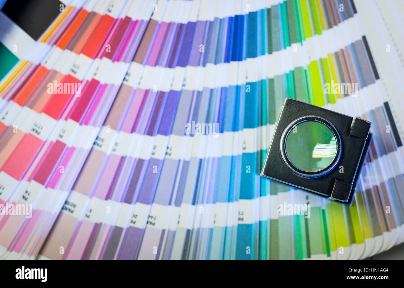 Color management in printing process with magnifying glass and color ...