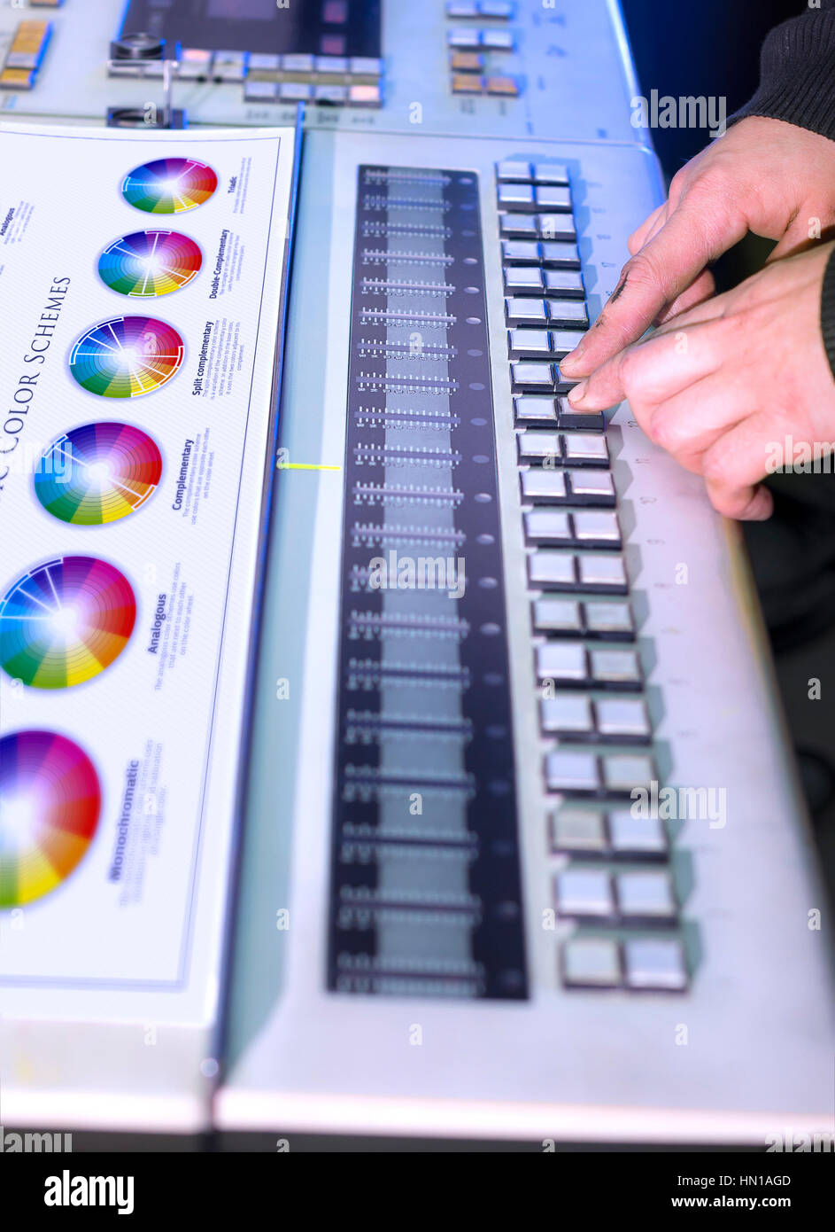 Young man in the process of offset printing and color correction Stock ...