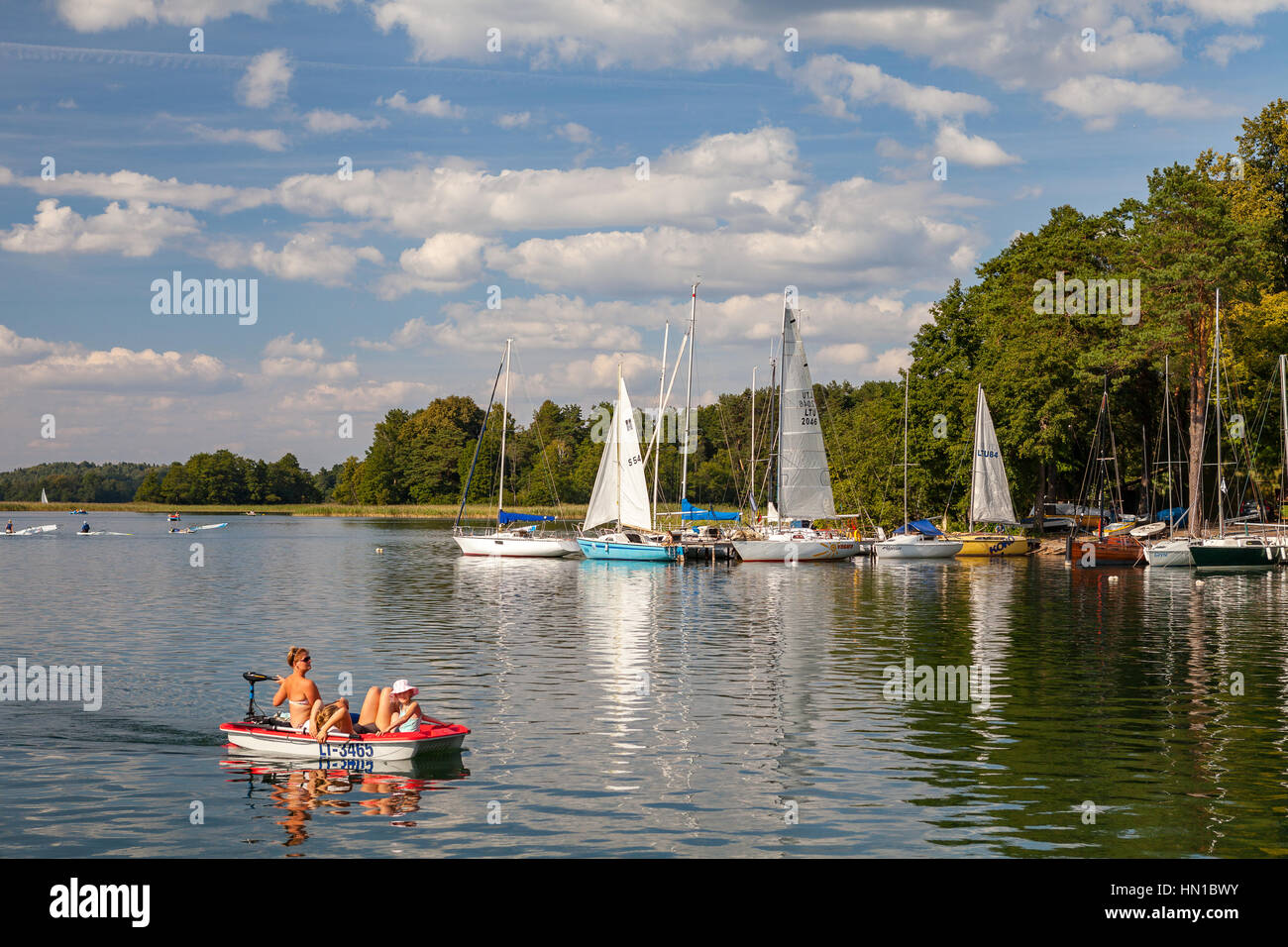 TRAKAI, LITHUANIA - 22 AUG 2015: Nice yahts reflecting in water of ...