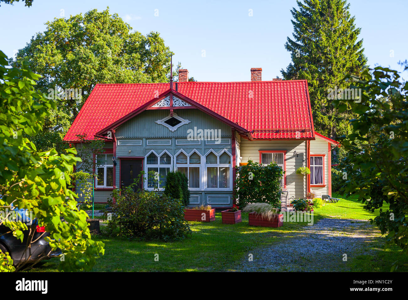 Traditional baltic and scandinavian cozy wooden house with red tiled ...