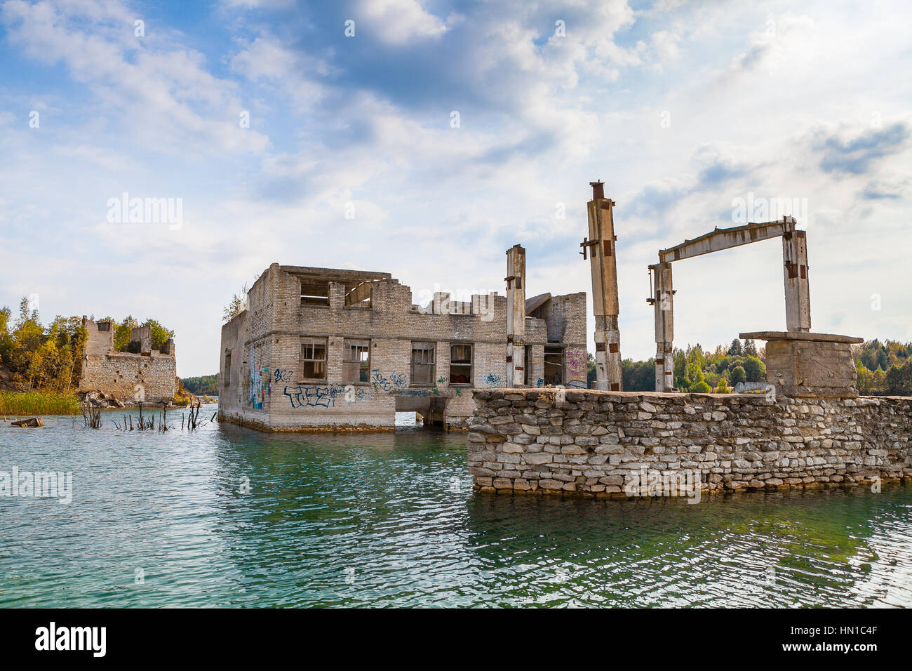 Sand quarry with a pond and abandoned prison in Rummu, Estonia Stock ...