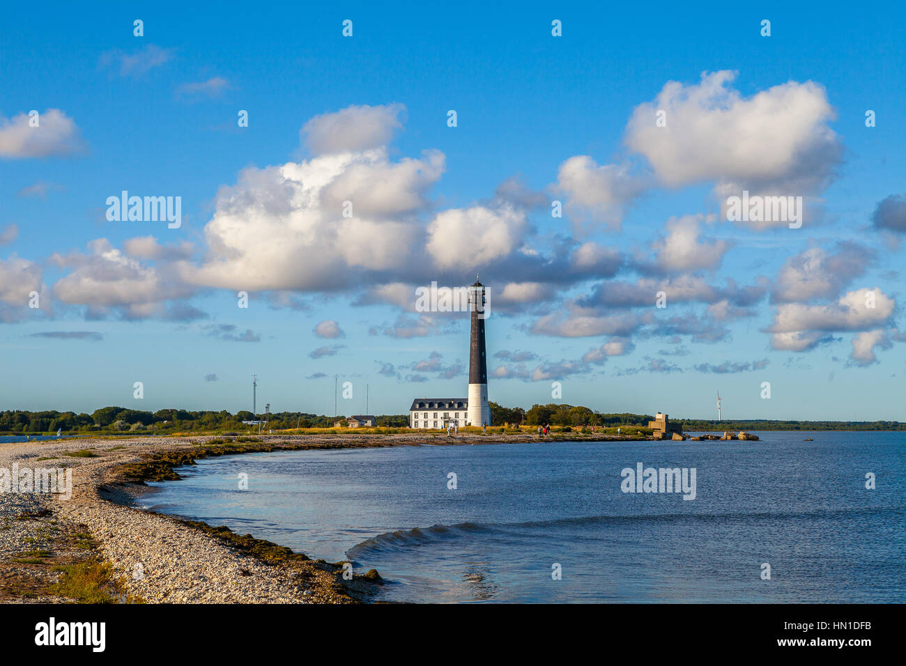 Sorve lighthouse against blue sky, Saaremaa island, Estonia. Long and ...