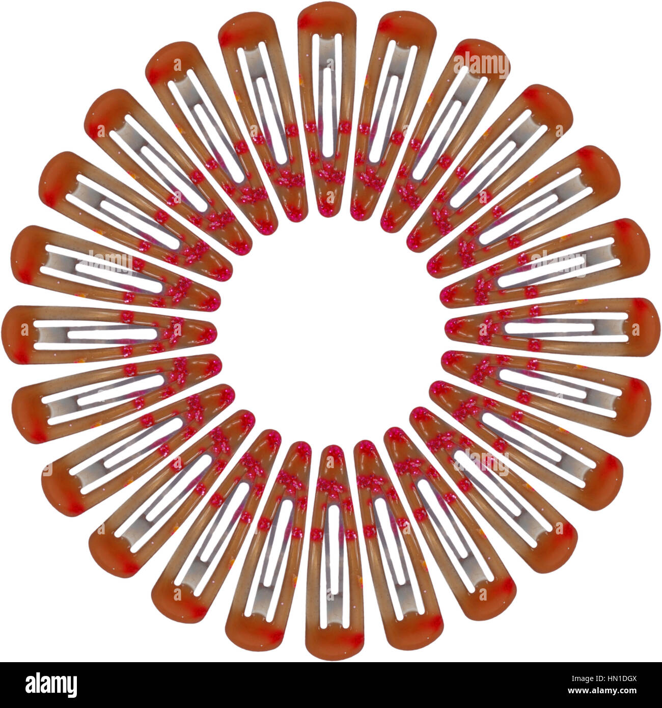 Brown hair clips in a circle isolated on white Stock Photo - Alamy