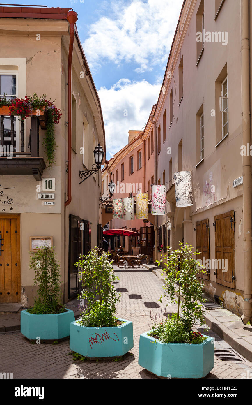 Old Vilnius street with greenery at sunny summer day Stock Photo - Alamy