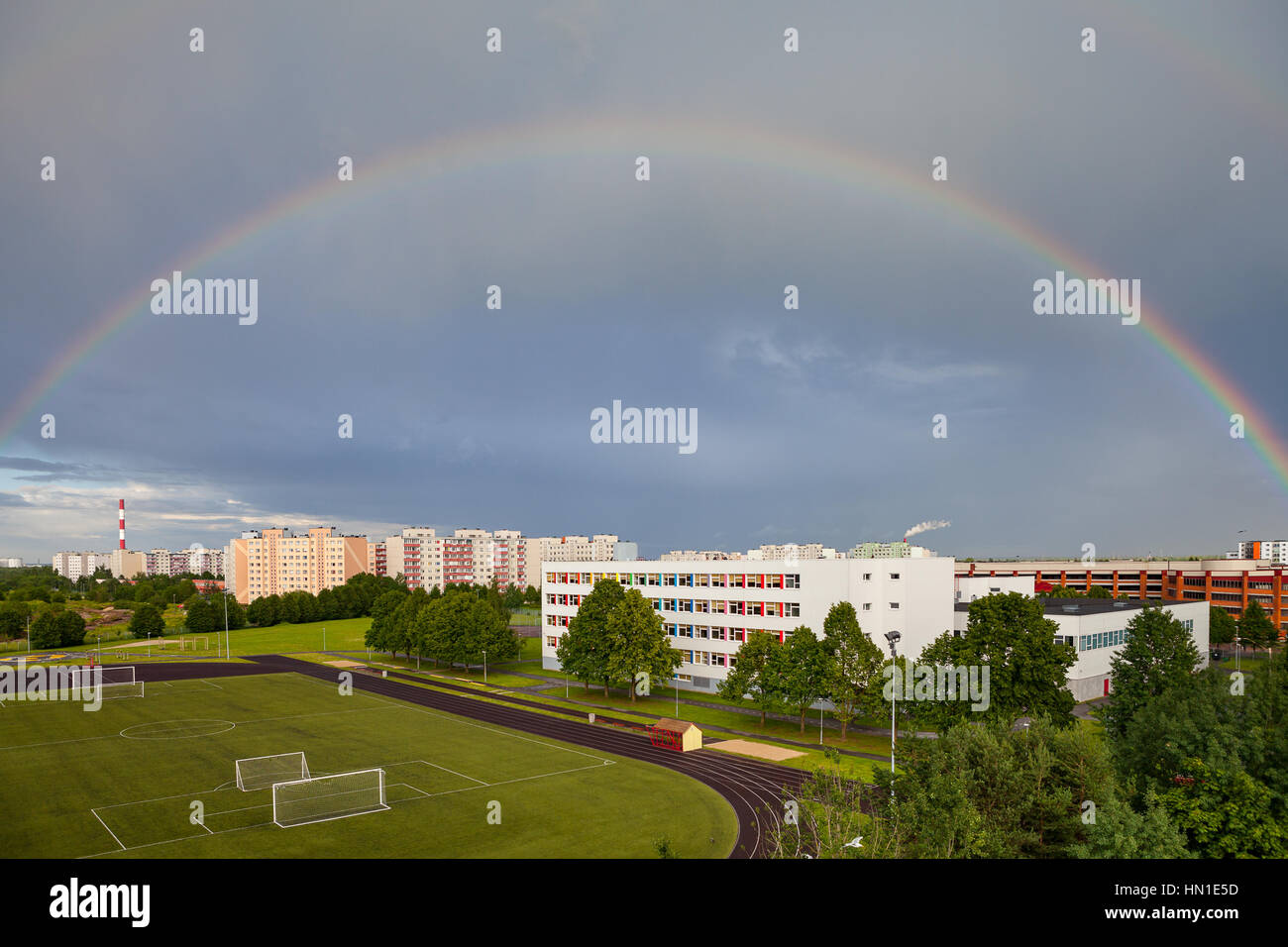 Rainbow over residental part of Tallinn city, Estonia Stock Photo - Alamy