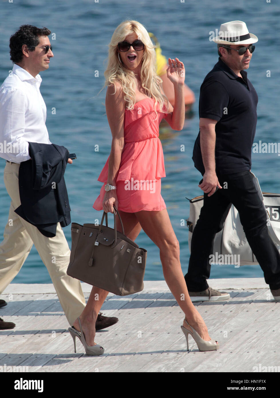 Victoria Silvstedt walks on a dock at the Hotel Du Cap in Antibes ...