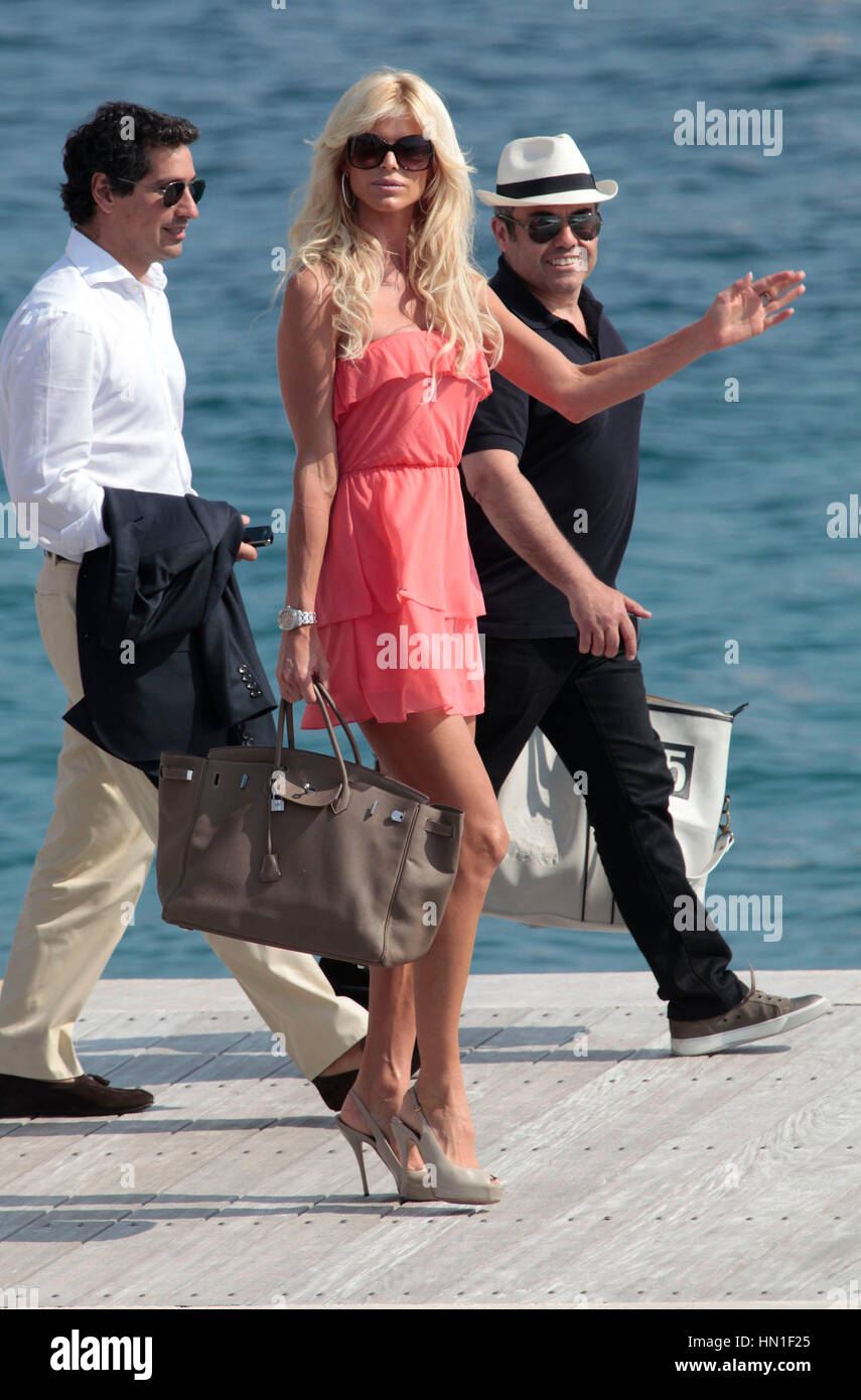 Victoria Silvstedt walks on a dock at the Hotel Du Cap in Antibes ...