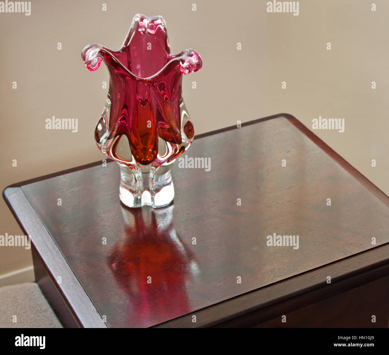 Red glass vase Stock Photo - Alamy