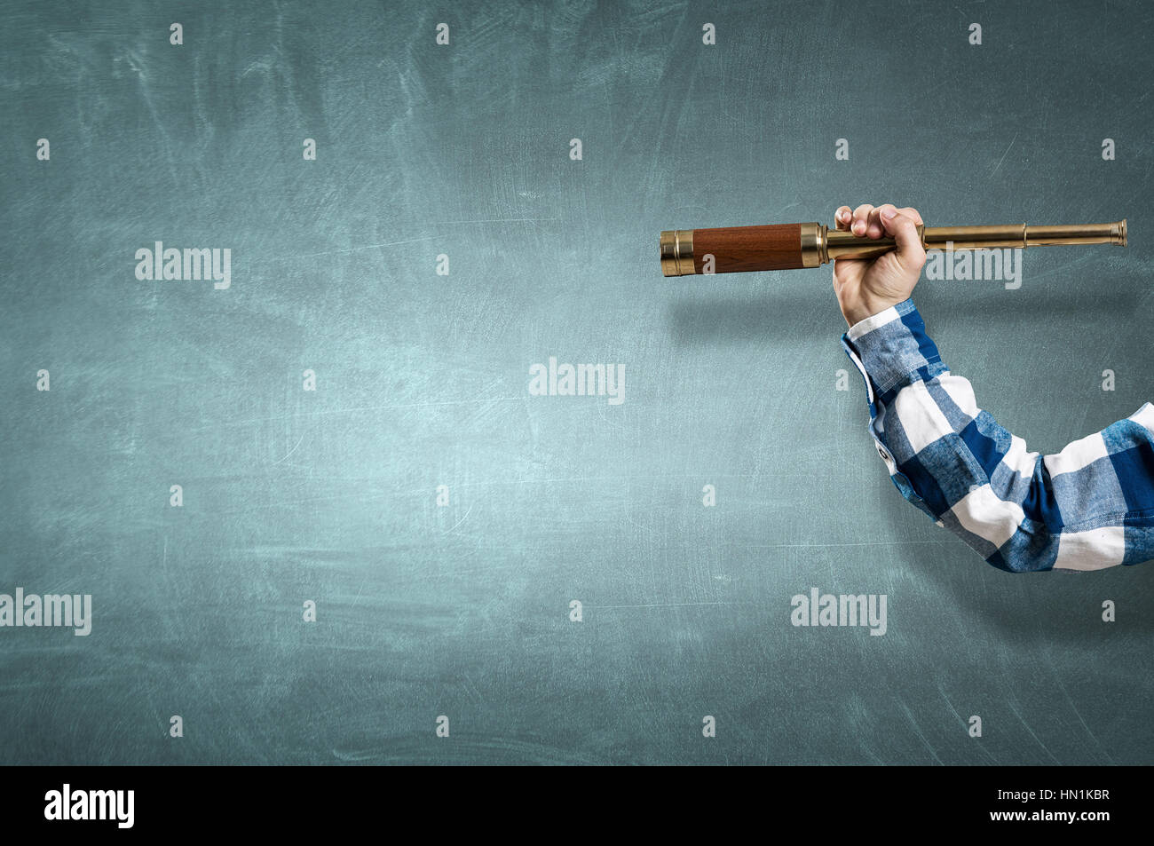 Old telescope close up in person hand Stock Photo - Alamy