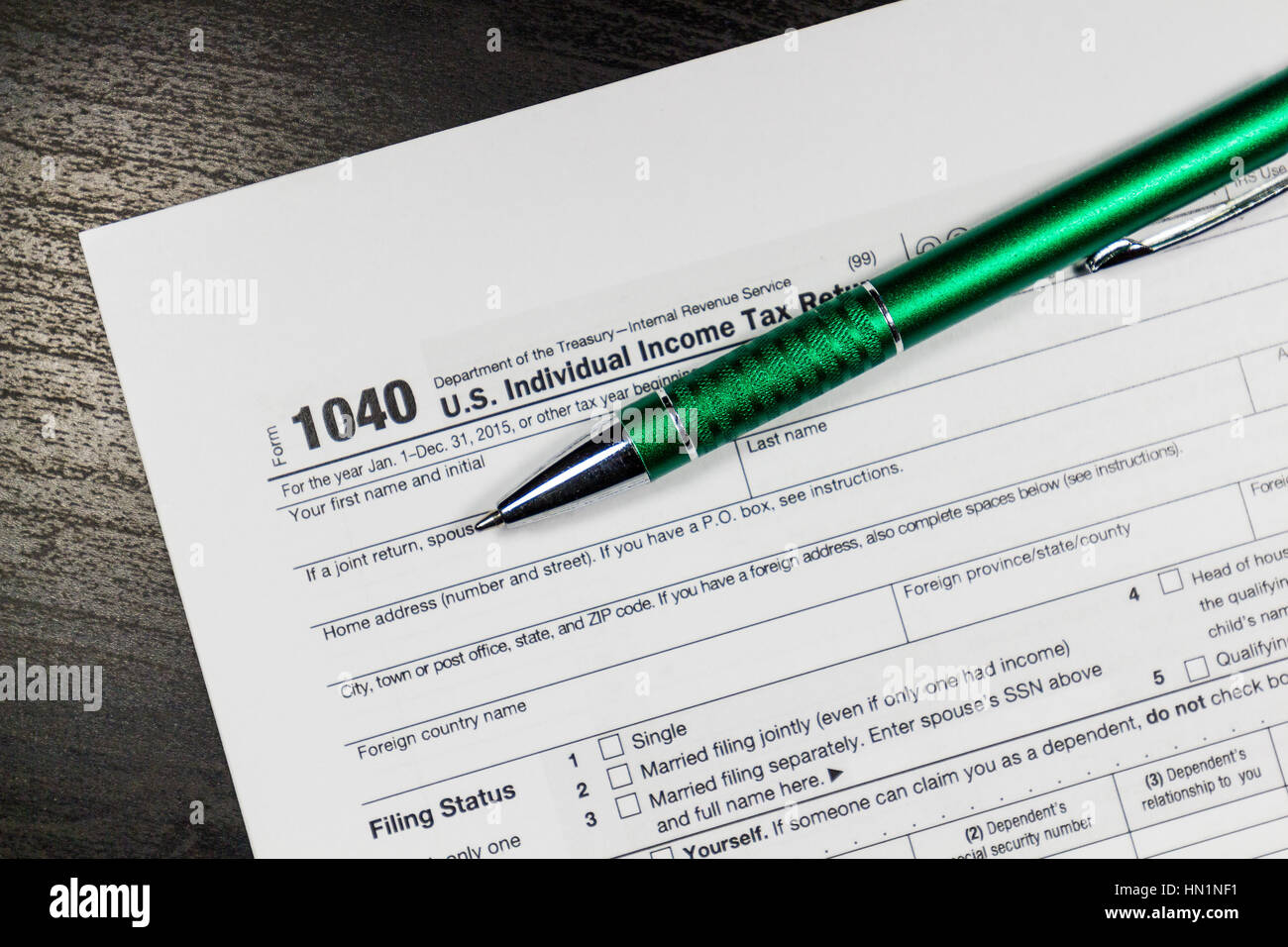 Tax form with pen and calculator taxation concept Stock Photo - Alamy