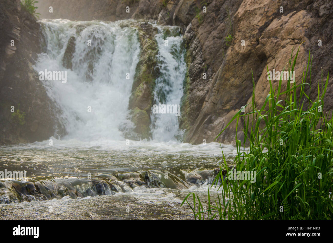 falling water in the morning mist. falling water in the dense morning ...