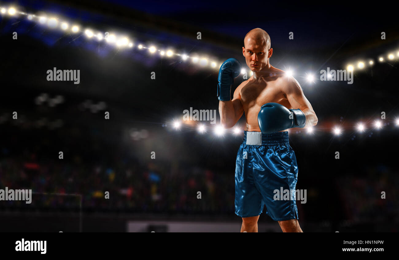 Professional box fighter on grand arena. Mixed media Stock Photo - Alamy