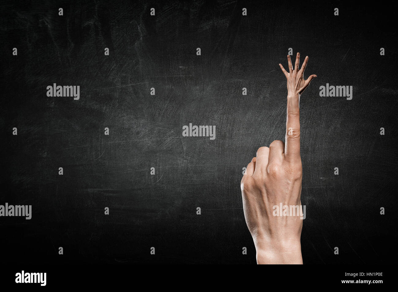 Close of hand showing five gesture on concrete background Stock Photo ...