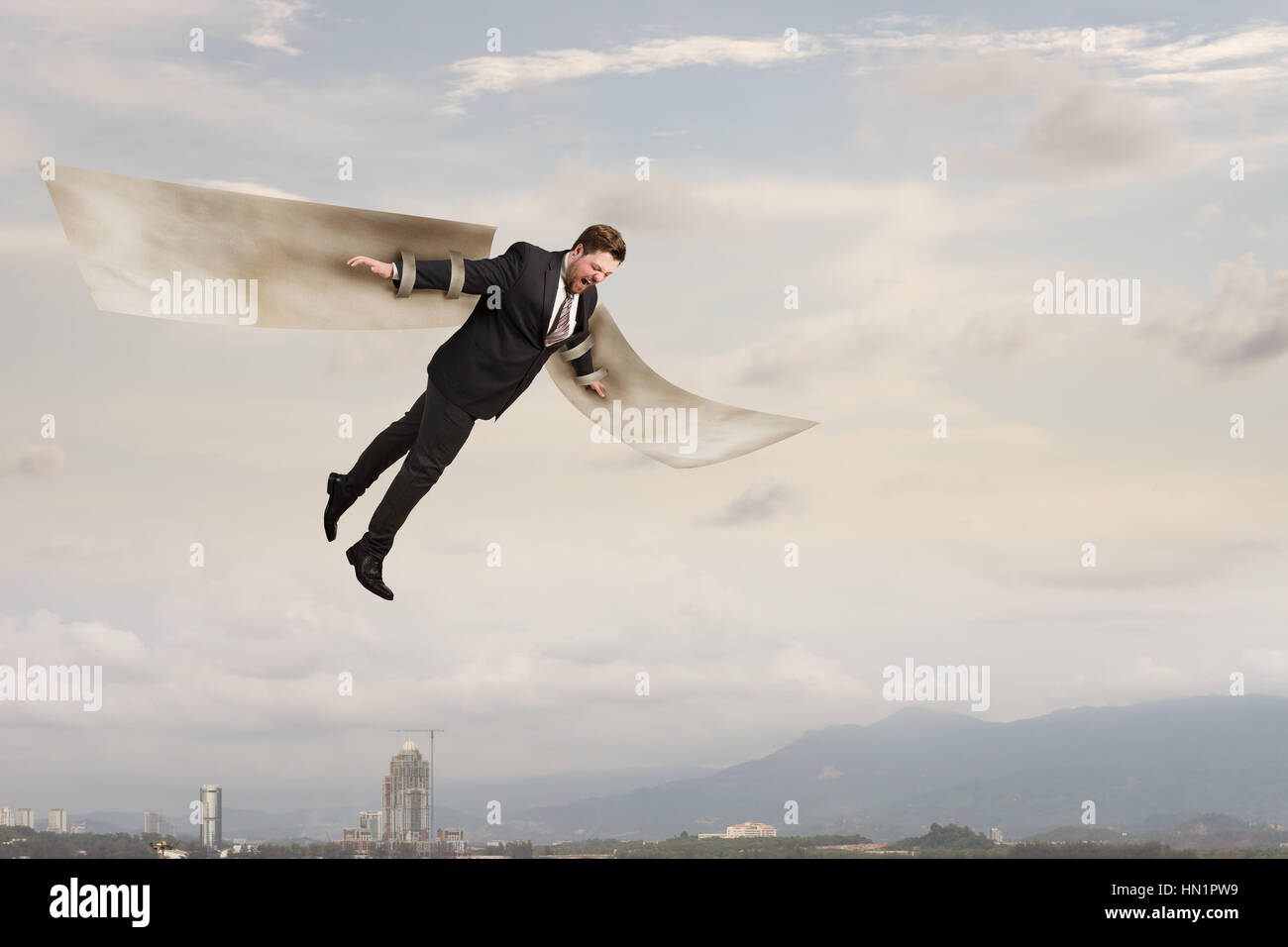 Businessman flying with wings hi-res stock photography and images - Alamy