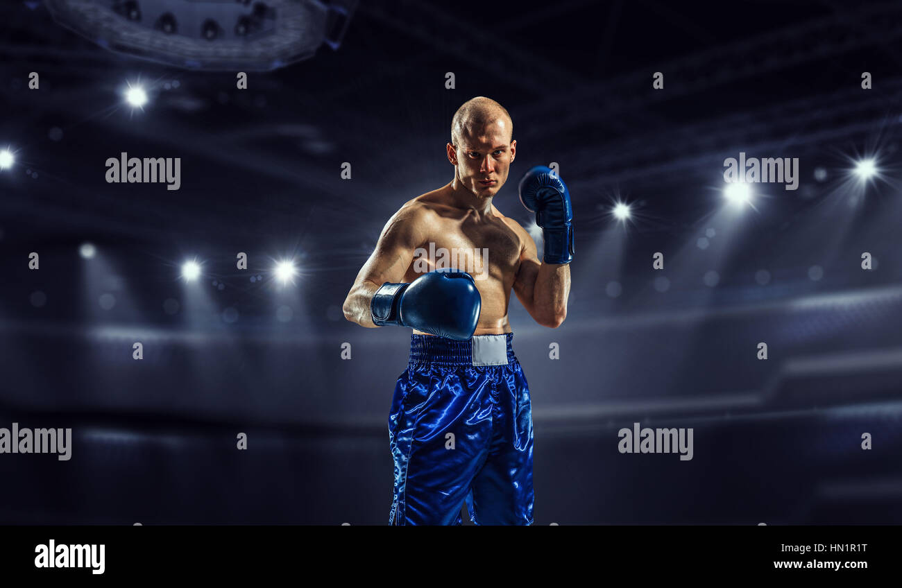 Professional box fighter on grand arena. Mixed media Stock Photo - Alamy