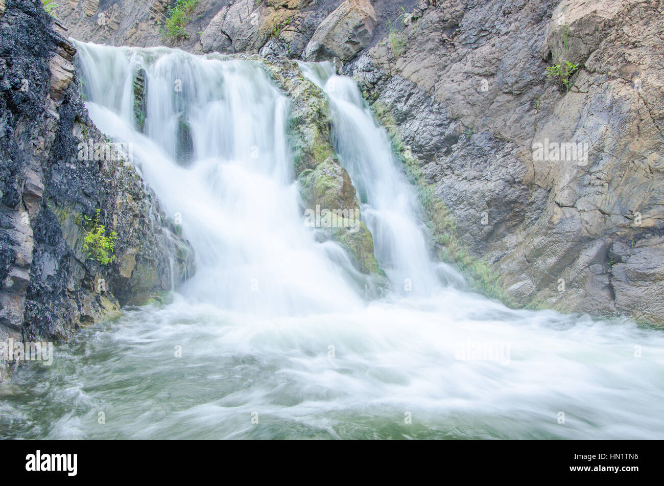falling water in the morning mist. falling water in the dense morning ...