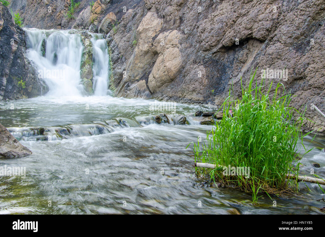 falling water in the morning mist. falling water in the dense morning ...