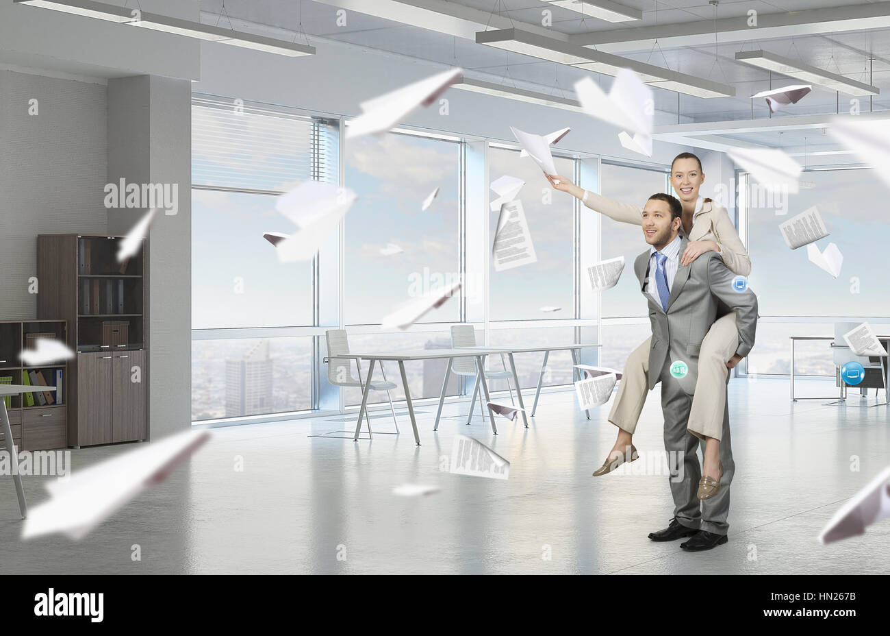 Businesspeople in office riding colleague back. Mixed media Stock Photo ...