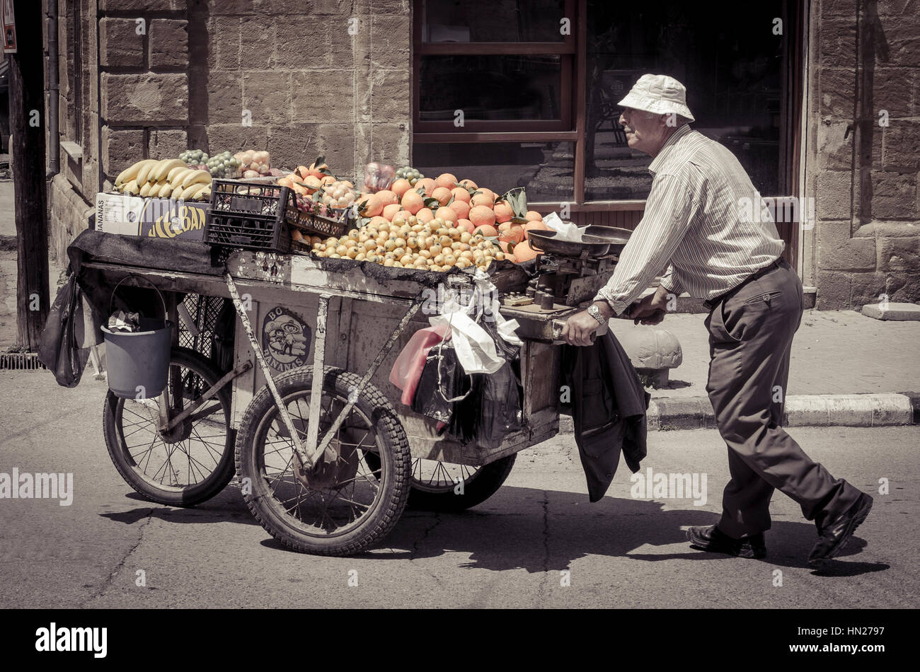 Man selling fruit form a barrow on a street in Nicosia, Cyprus Stock ...