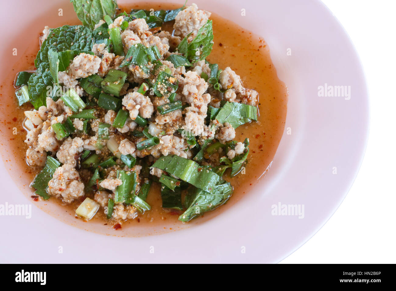 Thai food; Lab-Moo; Chopped pork mix with Thai spicy curry; white ...