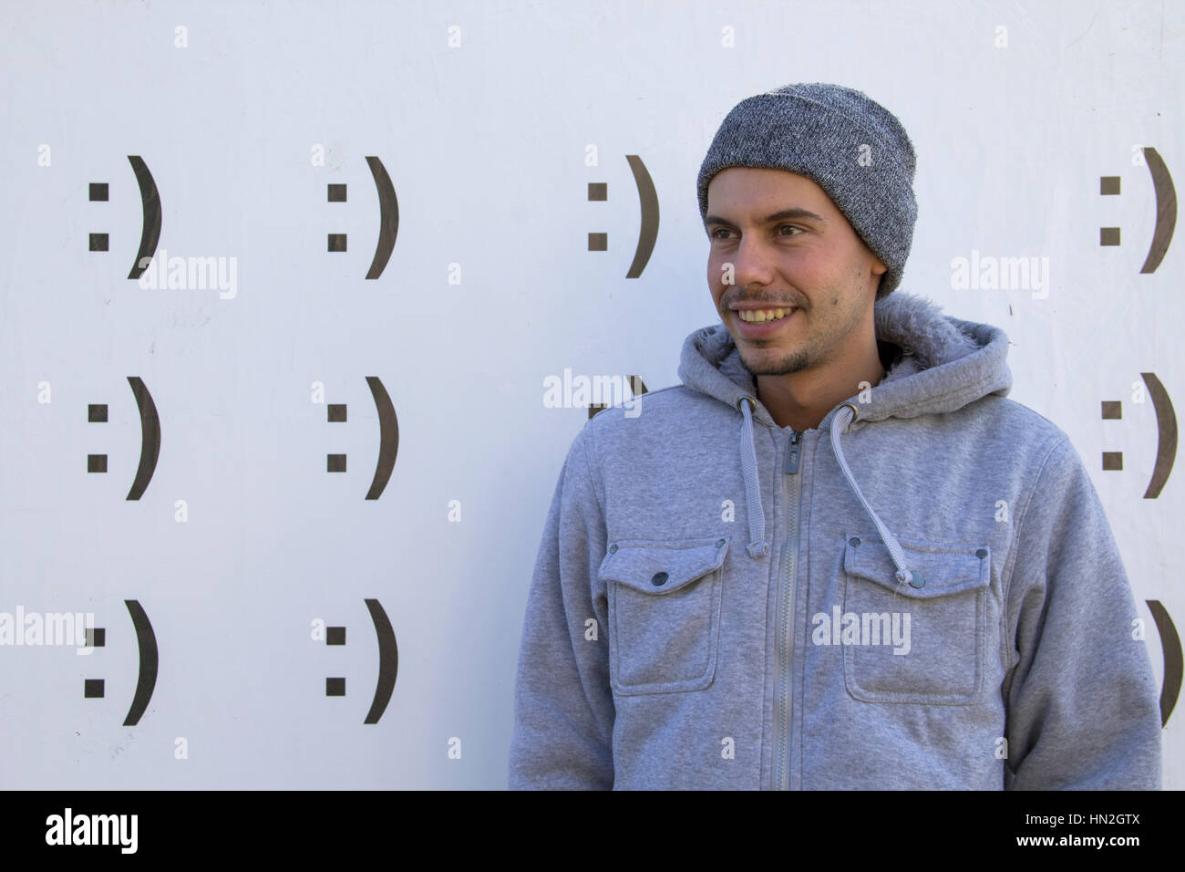 Young caucasian man smiles hi-res stock photography and images - Alamy