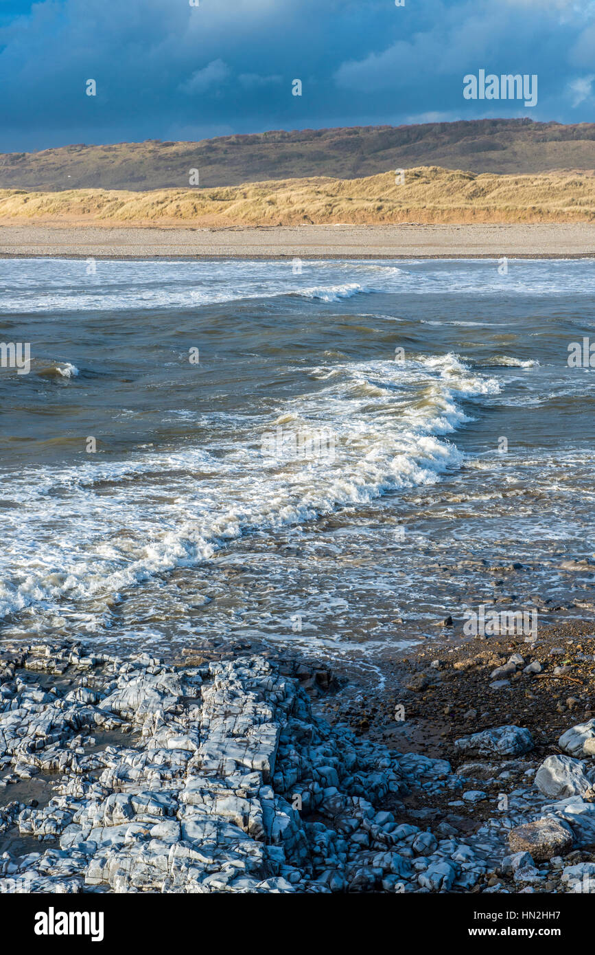 The estuary of the River Ogmore where it enters the sea at Ogmore by ...