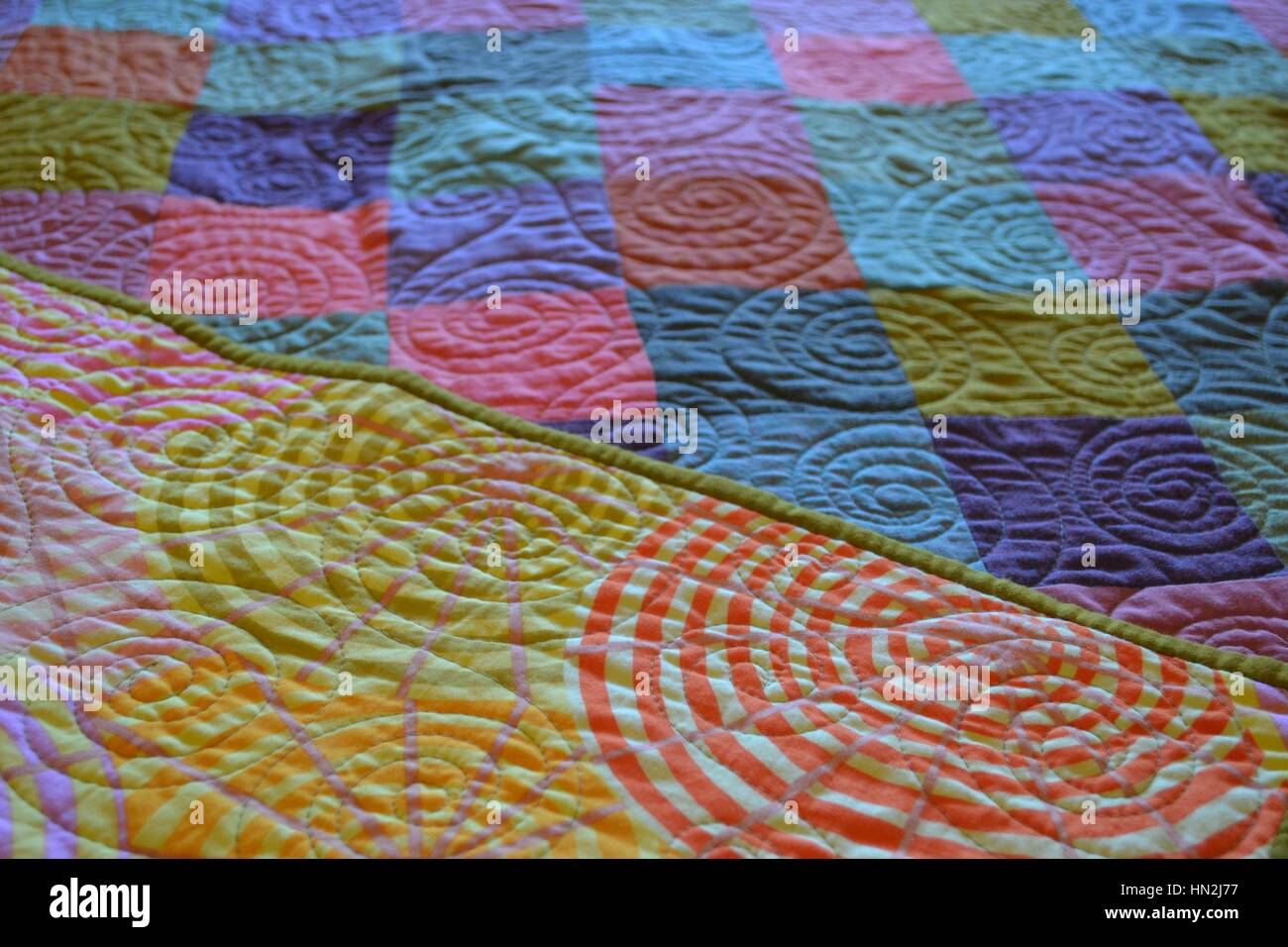 Handmade crafter quilt with intricate circle stitch pattern Stock Photo ...