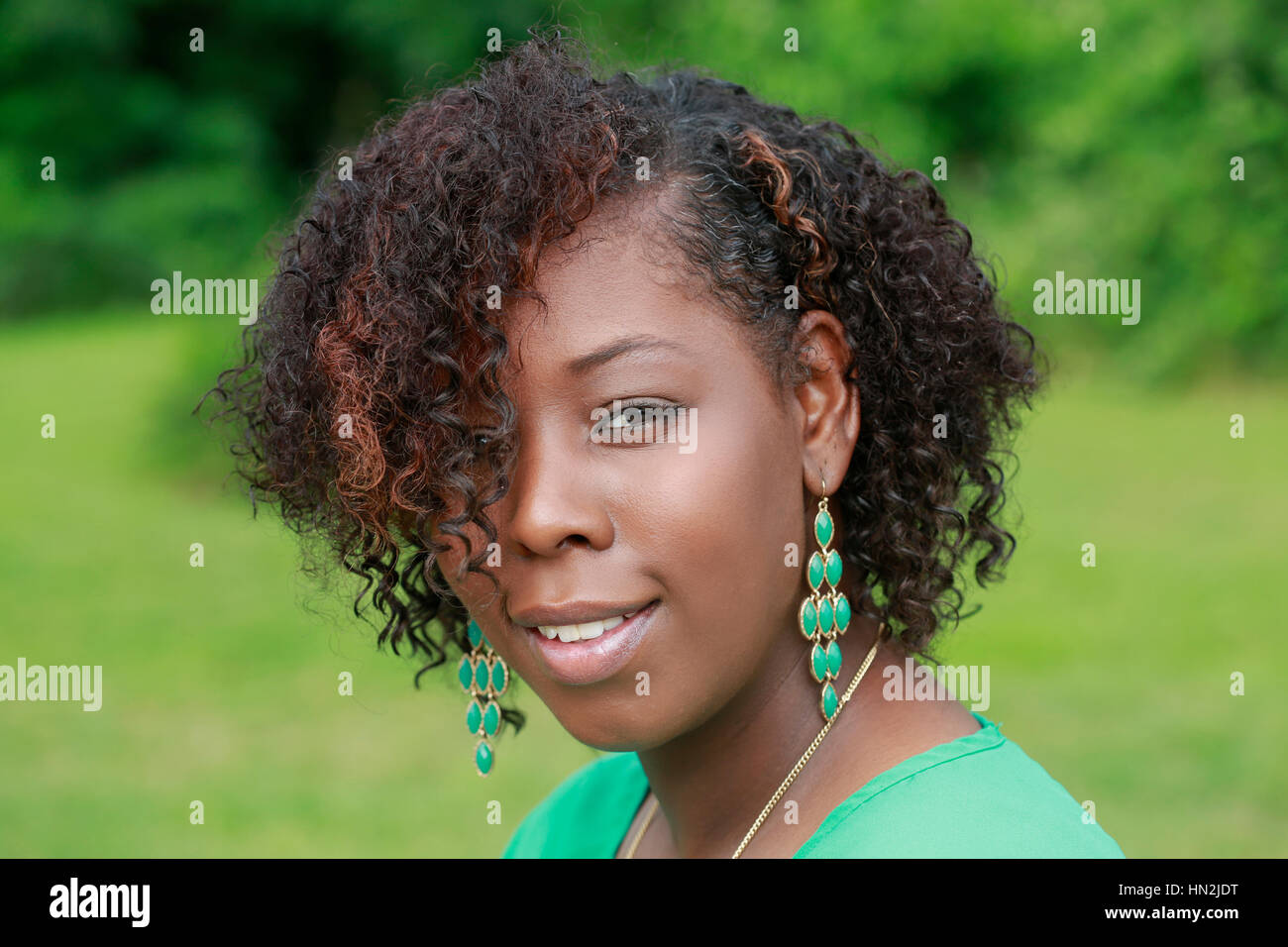 Close-up outdoor portrait of healthy and beautiful African American ...