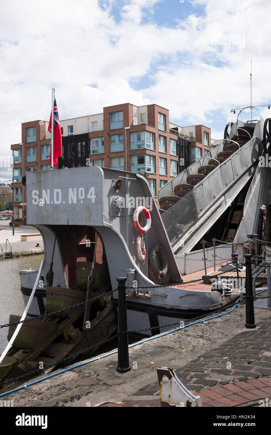 Volunteers working on a historic steam dredger in Gloucester Docks ...