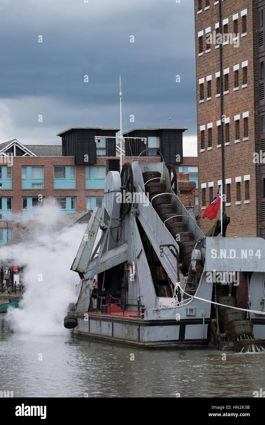 Volunteers working on a historic steam dredger in Gloucester Docks ...