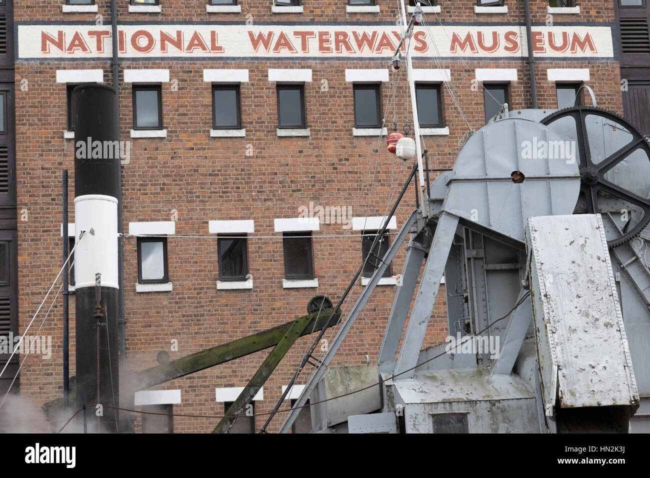 Volunteers working on a historic steam dredger in Gloucester Docks ...