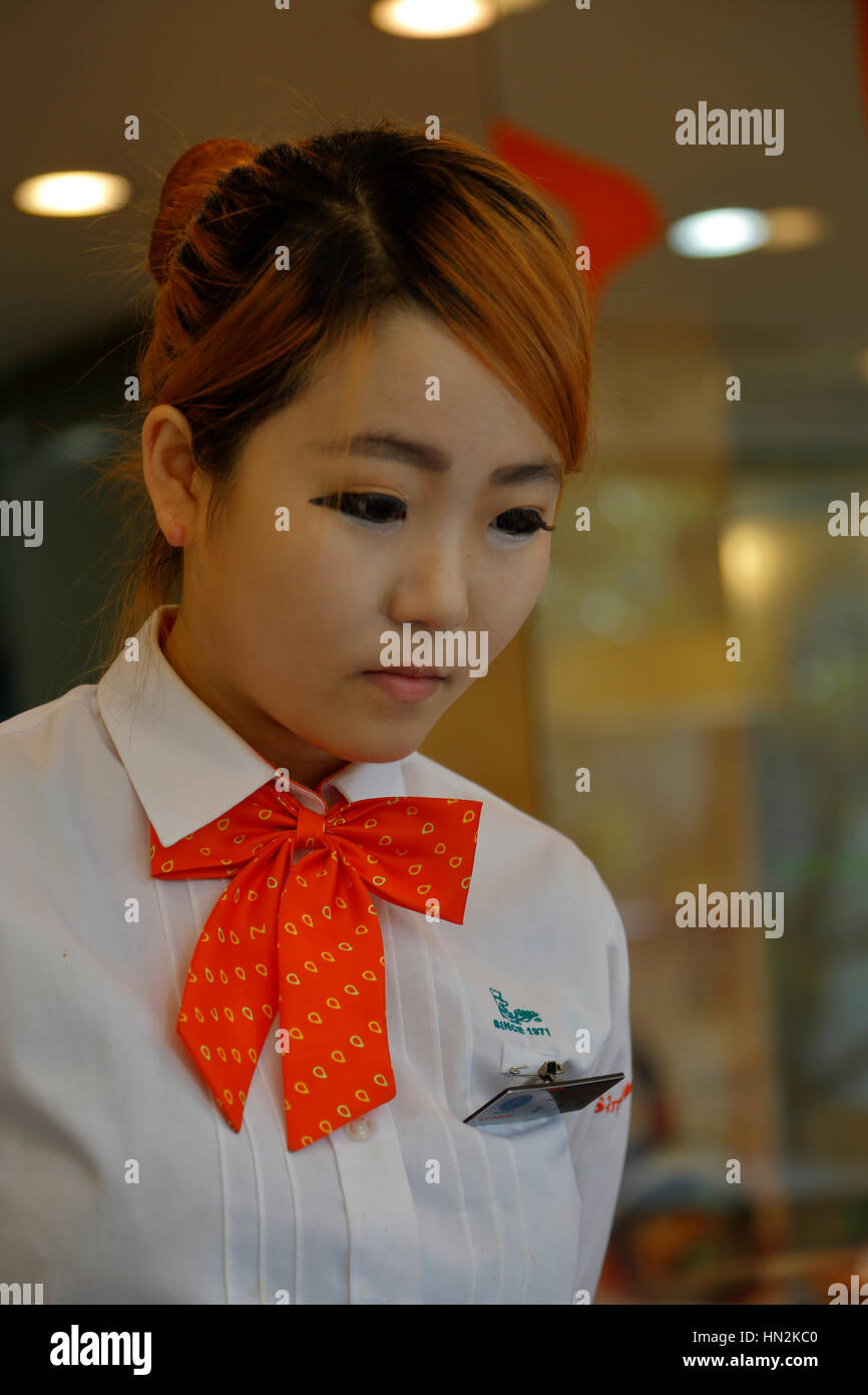 South Korea, National Capital Area, Seoul, waitress working at Seoul ...