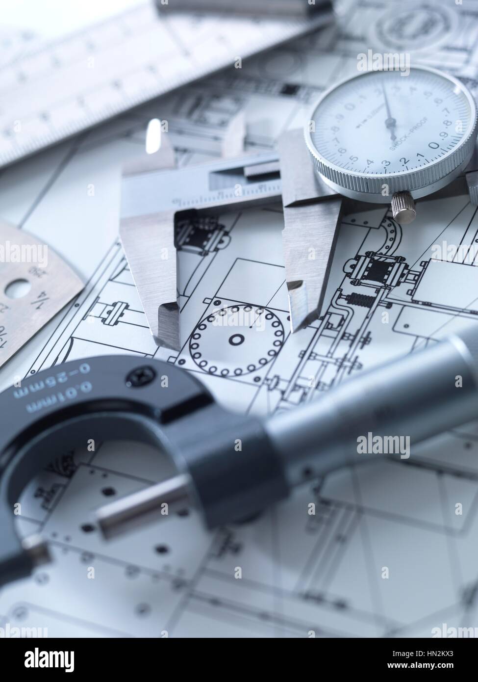 Drawing and measuring equipment on an engineering blue print Stock ...