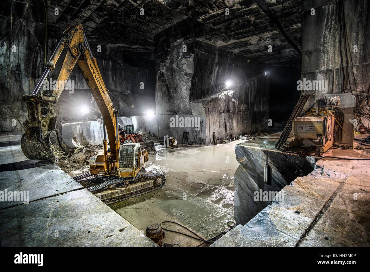 Heavy machinery inside marble quarries of Carrara, Italy Stock Photo ...