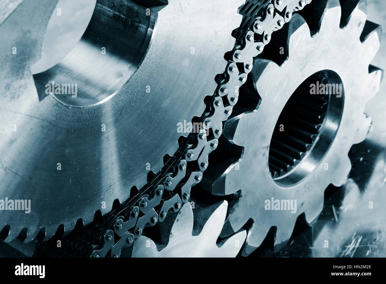 Large gears with chain Stock Photo - Alamy