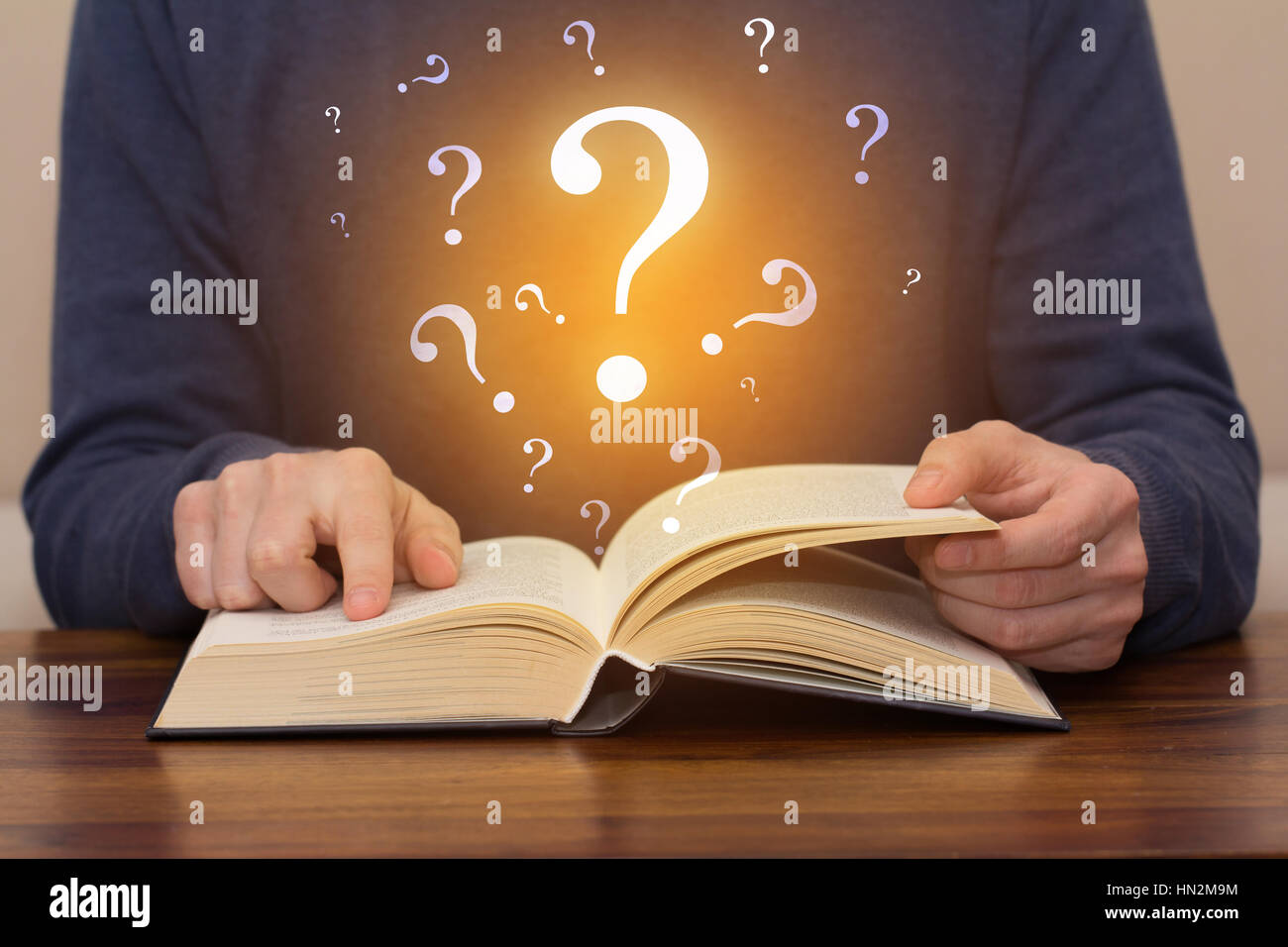 question mark book Stock Photo - Alamy