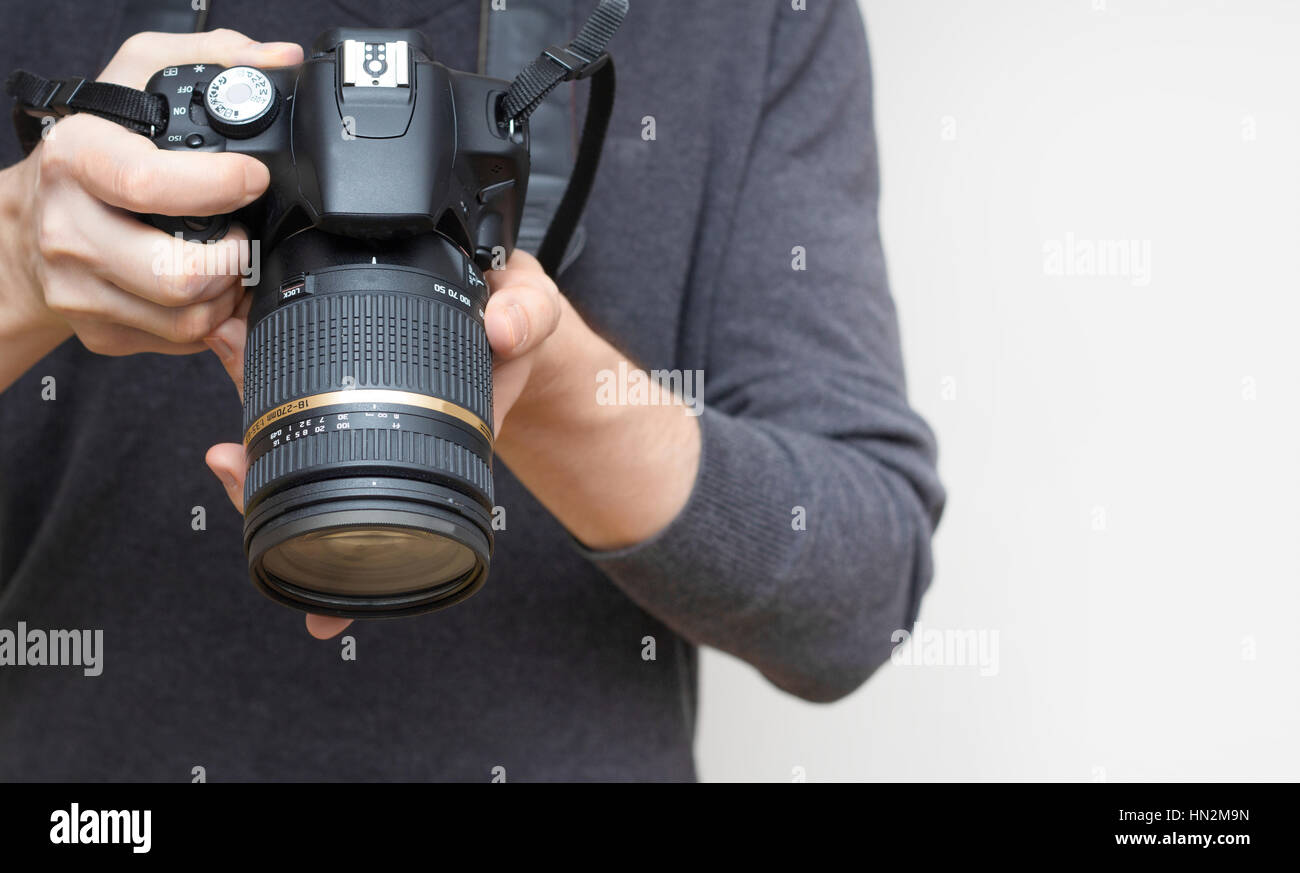 photographer hands holding camera Stock Photo - Alamy