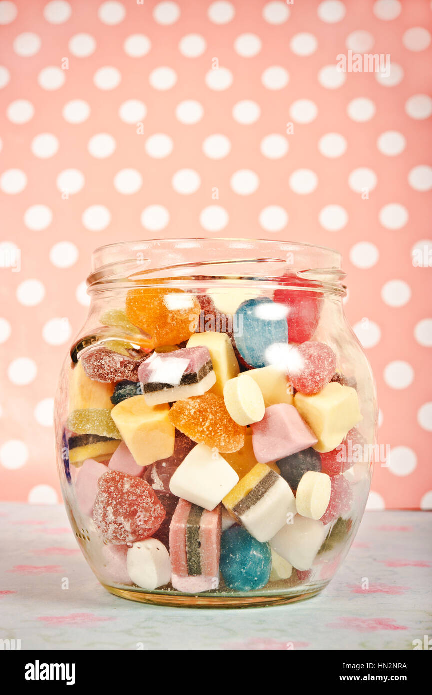 variety of candies in a jar Stock Photo - Alamy