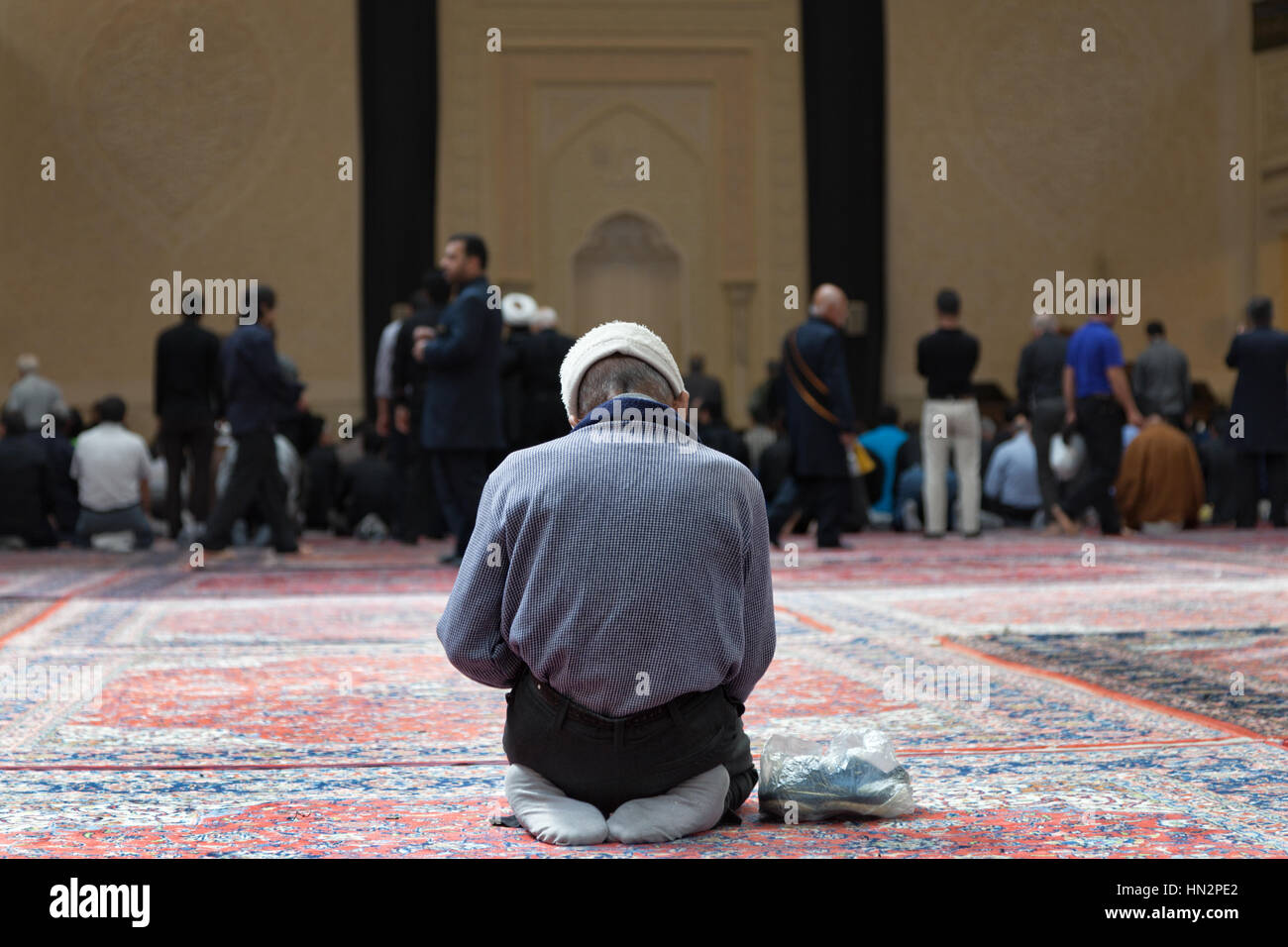 Old man praying in a mosque, Shiraz, Iran Stock Photo - Alamy
