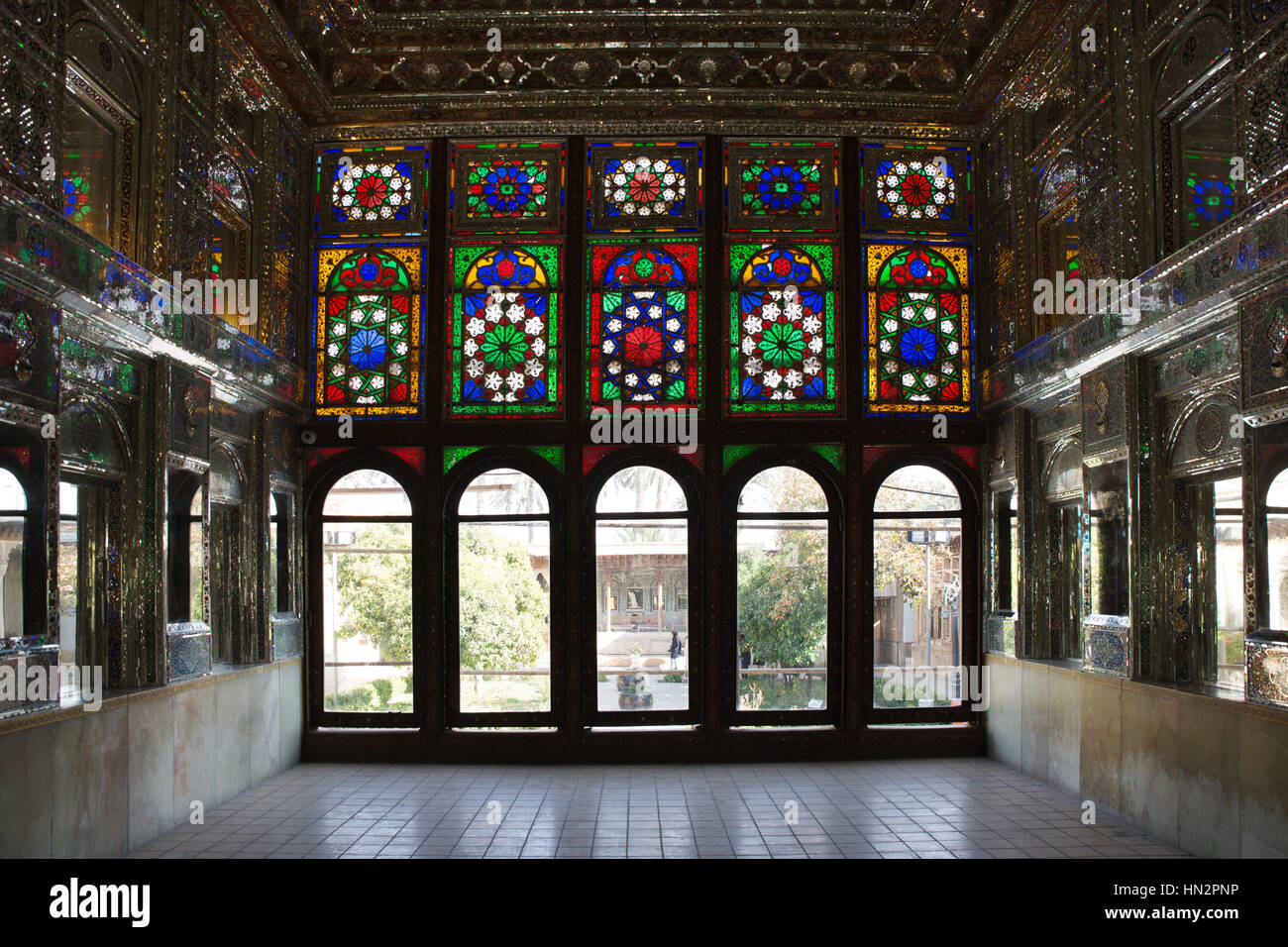Interior with stained glass windows of the Zinat ol Molk Mansion ...