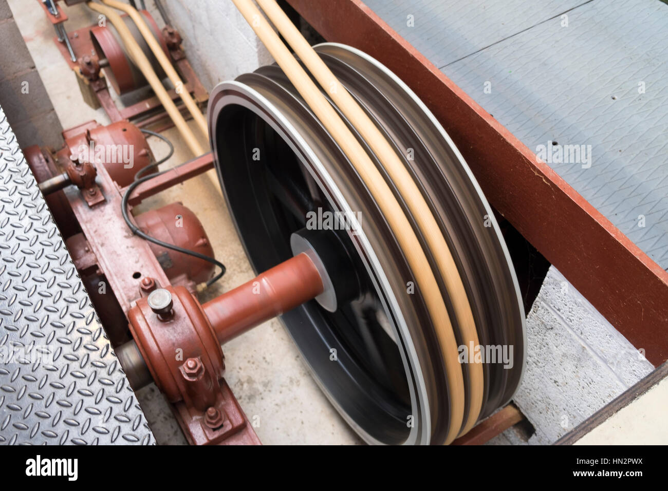Old machine belt wheel Stock Photo - Alamy