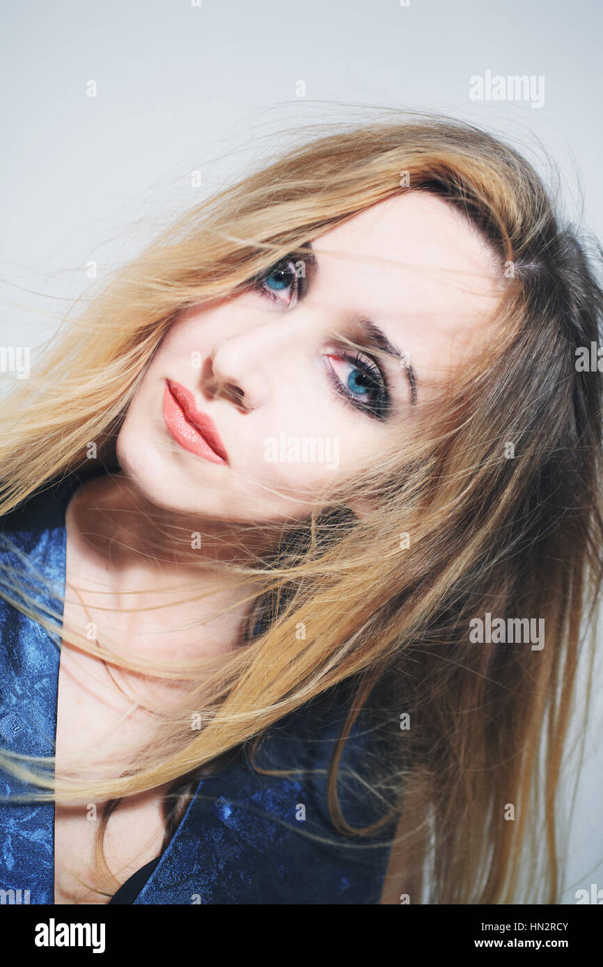 Long blonde hair girl portrait studio hi-res stock photography and ...